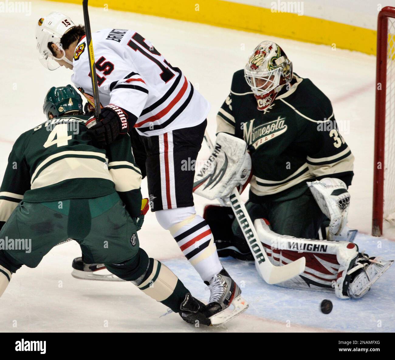 Minnesota Wild's goalie Niklas Backstrom, right, of Finland, stops the ...
