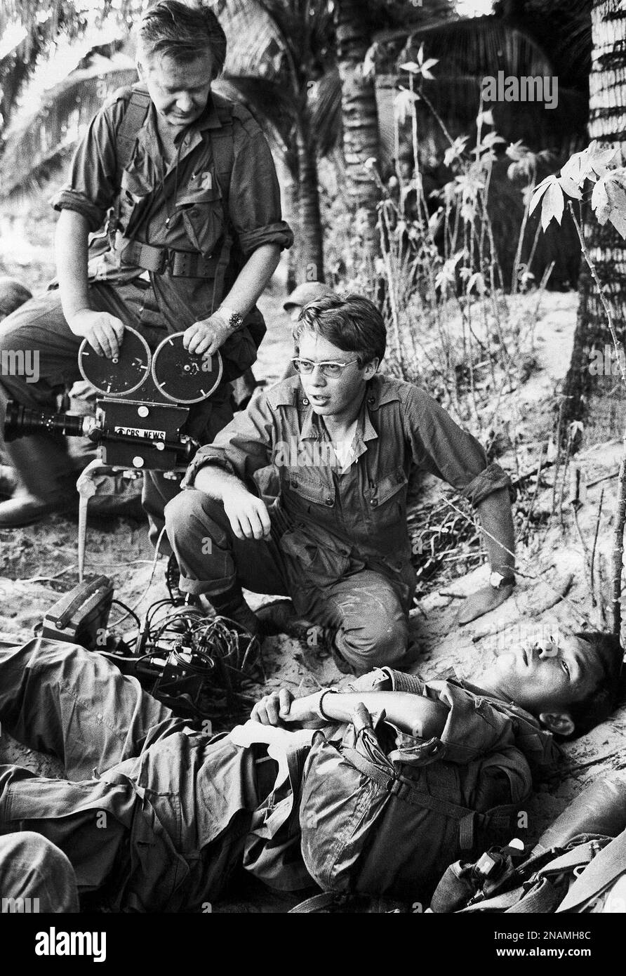 Unidentified photographers at work during the Vietnam War in Vietnam in ...