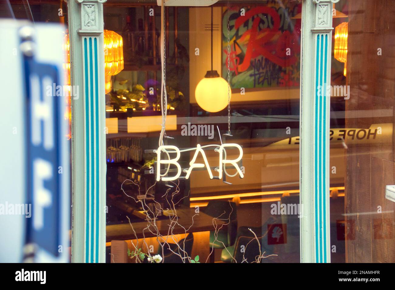 Bar sign in window Stock Photo - Alamy