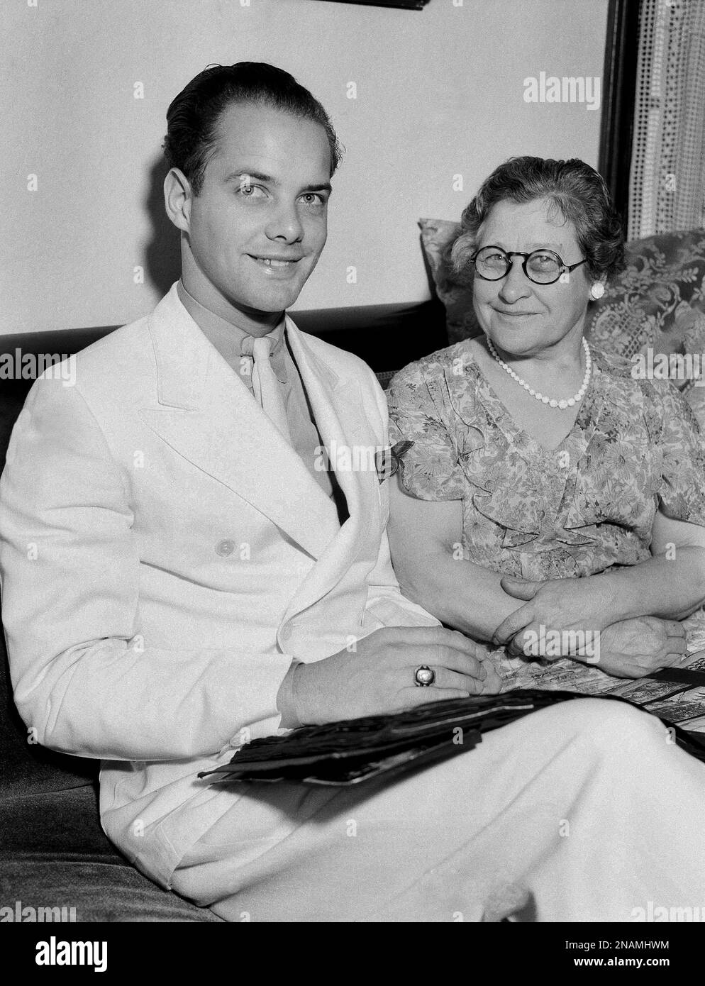 Robert Thomas, left, and his adoptive mother, Mrs. E.R. Thomas are ...