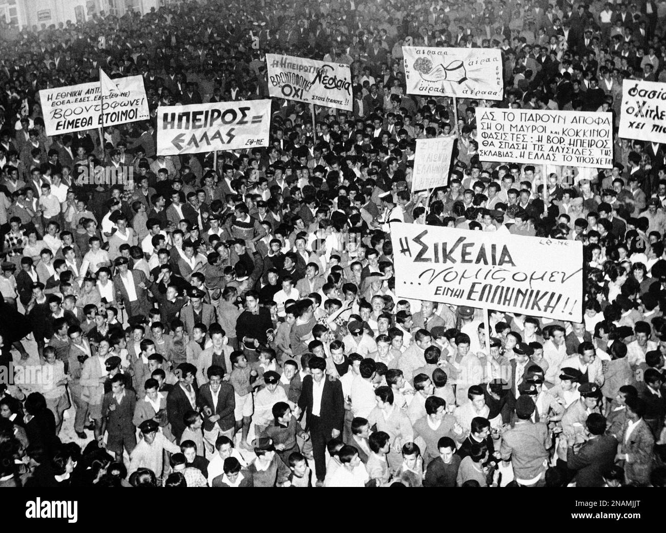 Between five and six thousand persons carry banners in an anti-Italian ...