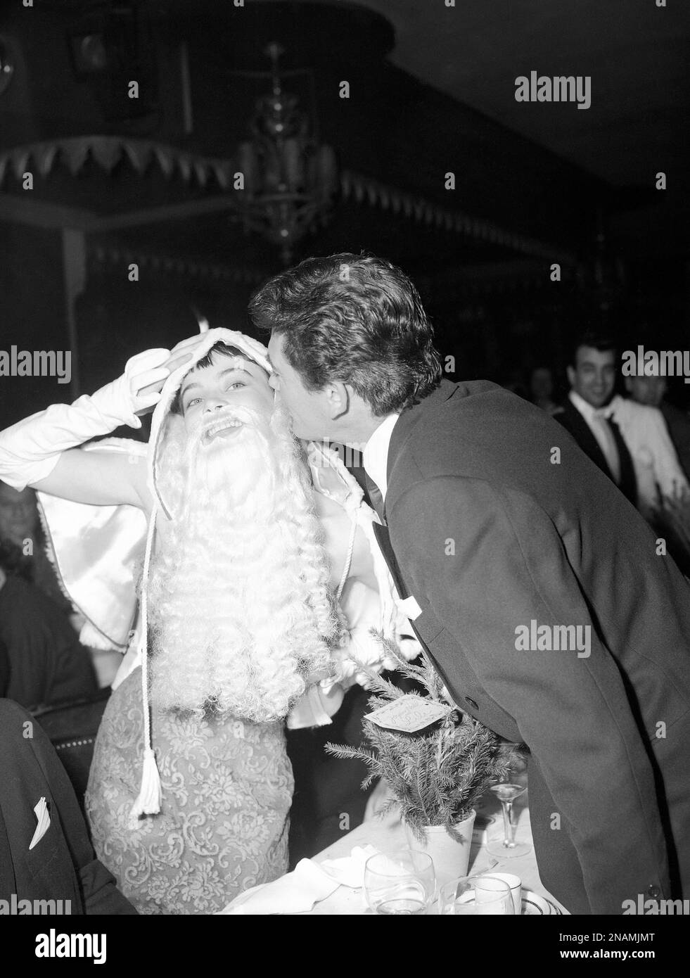 French actor Jean Marais is about to kiss fellow actress and dancer ...