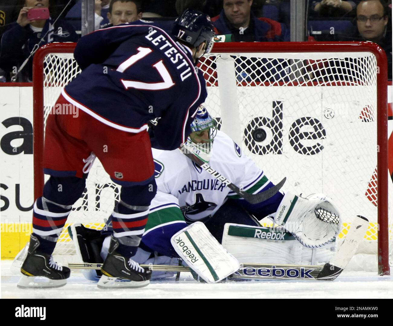 Columbus Blue Jackets' Mark Letestu (17) scores a goal past Vancouver ...