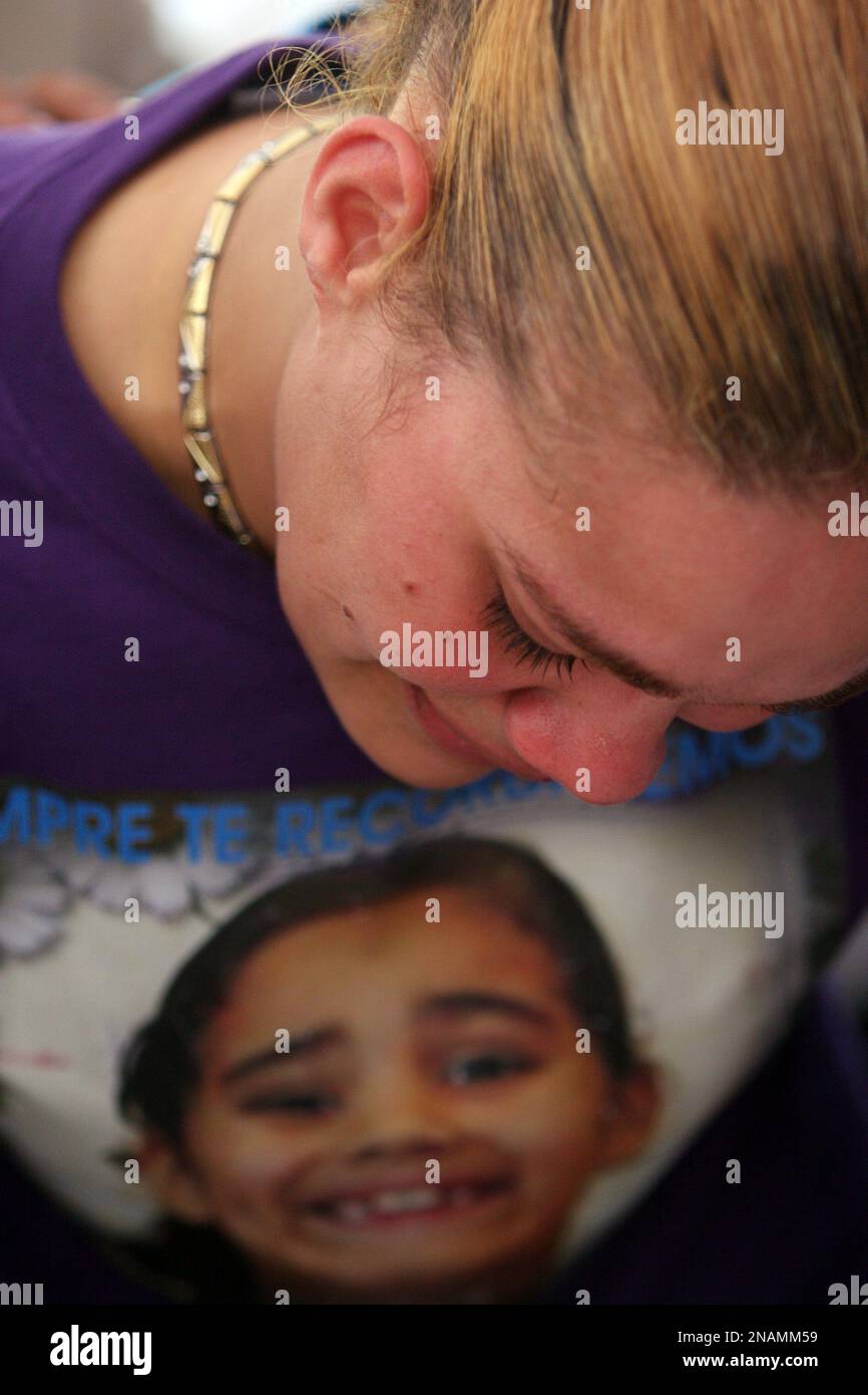Wearing a T-shirt with a photo of her daughter, Jorelys Galarza Rivera ...