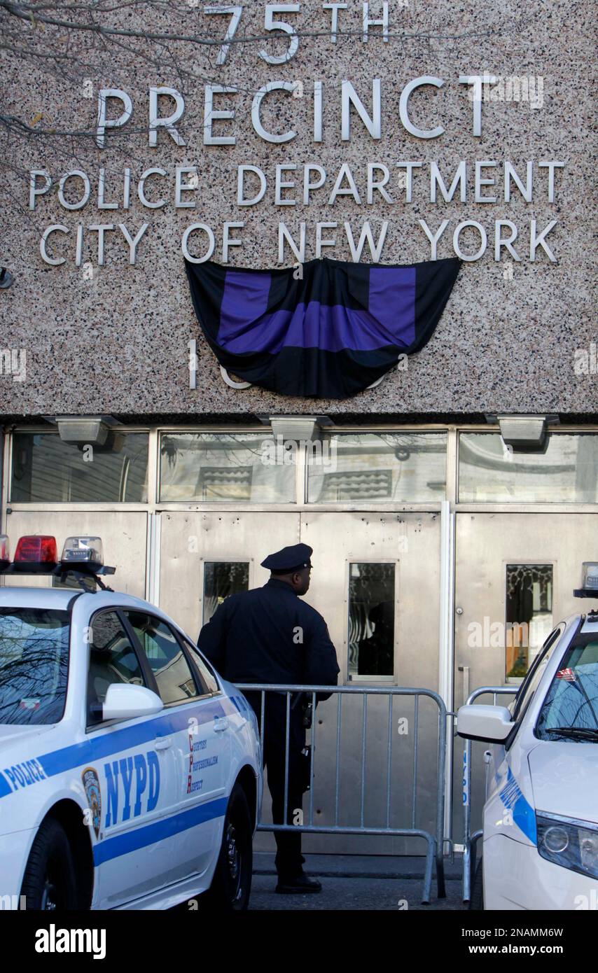 Bunting hangs over the entrance of the 75th Precinct in New York in ...