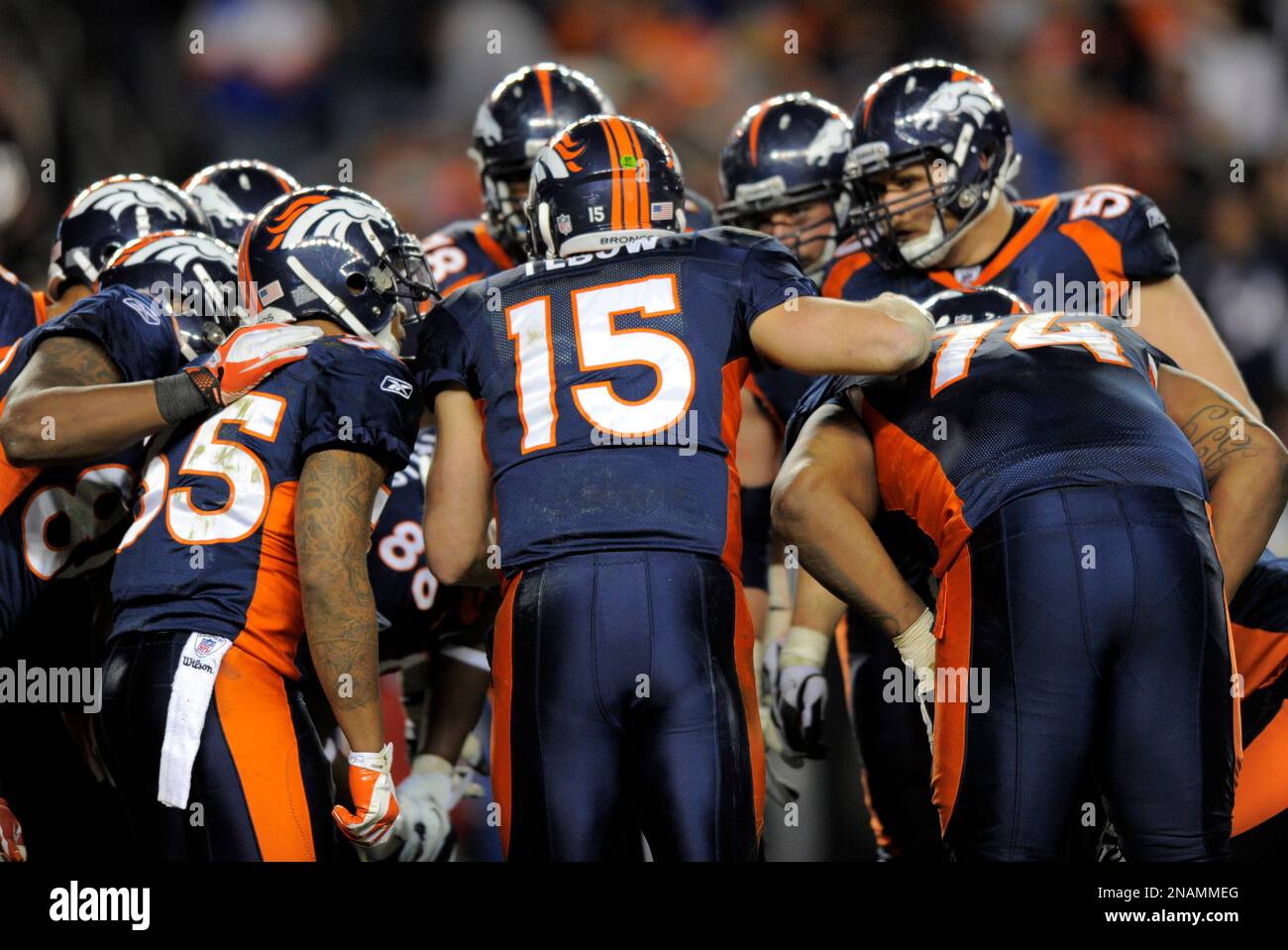 Denver Broncos quarterback Tim Tebow huddles the offense during an NFL ...