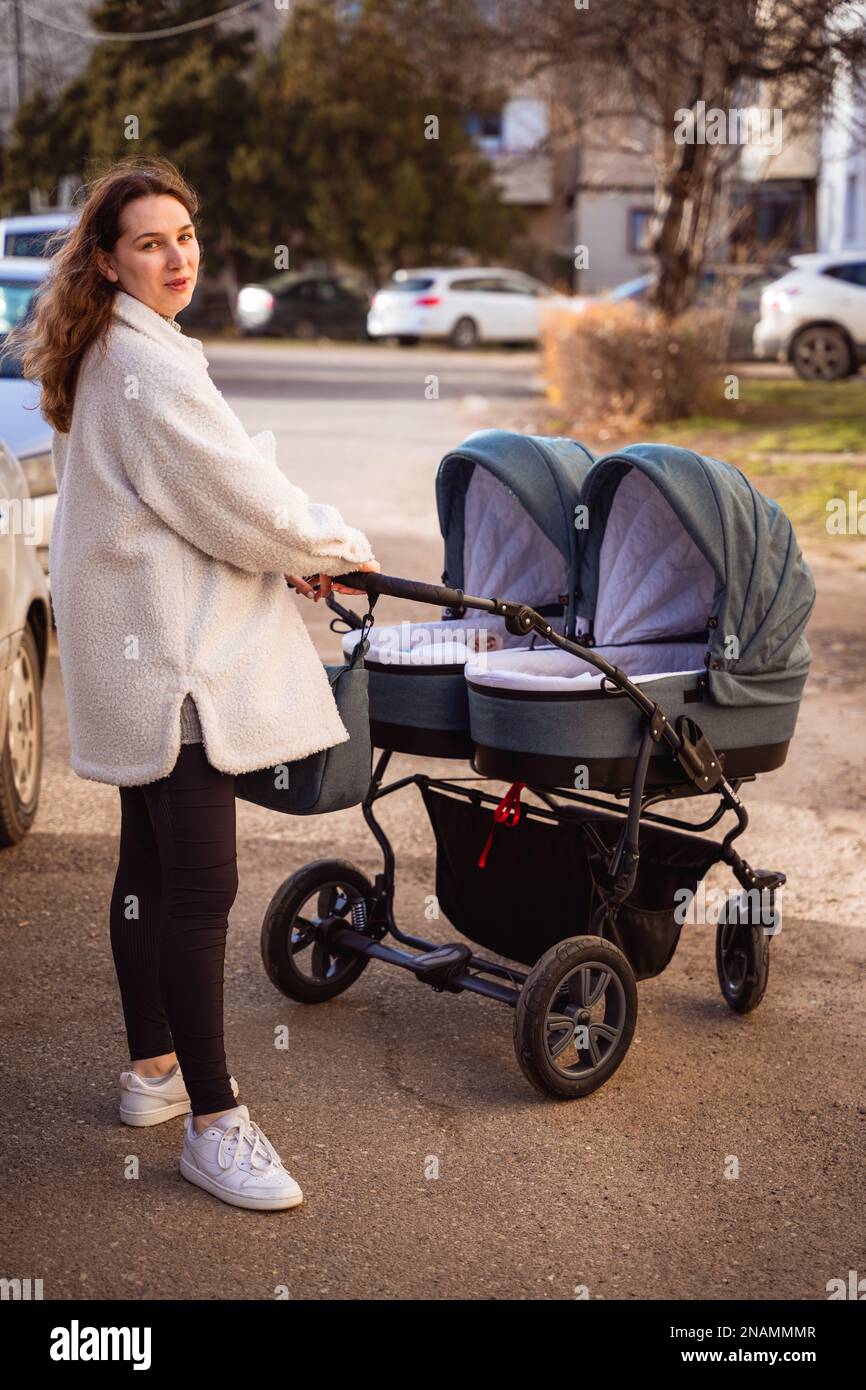 Stroller woman twin hi-res stock photography and images - Alamy