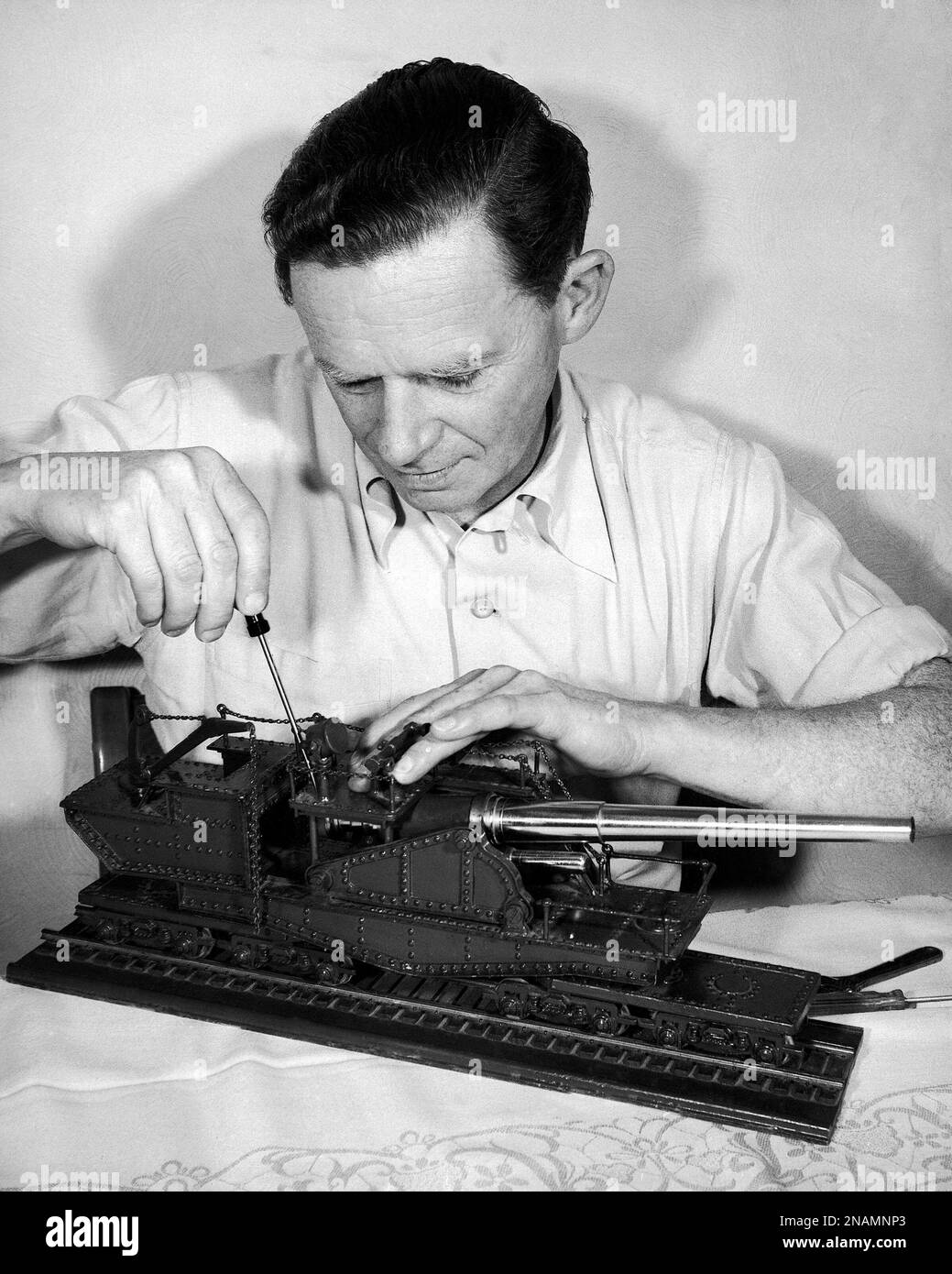 Dr. Elmer McKeen, a Huntington Park, Calif., dentist, goes in for ...