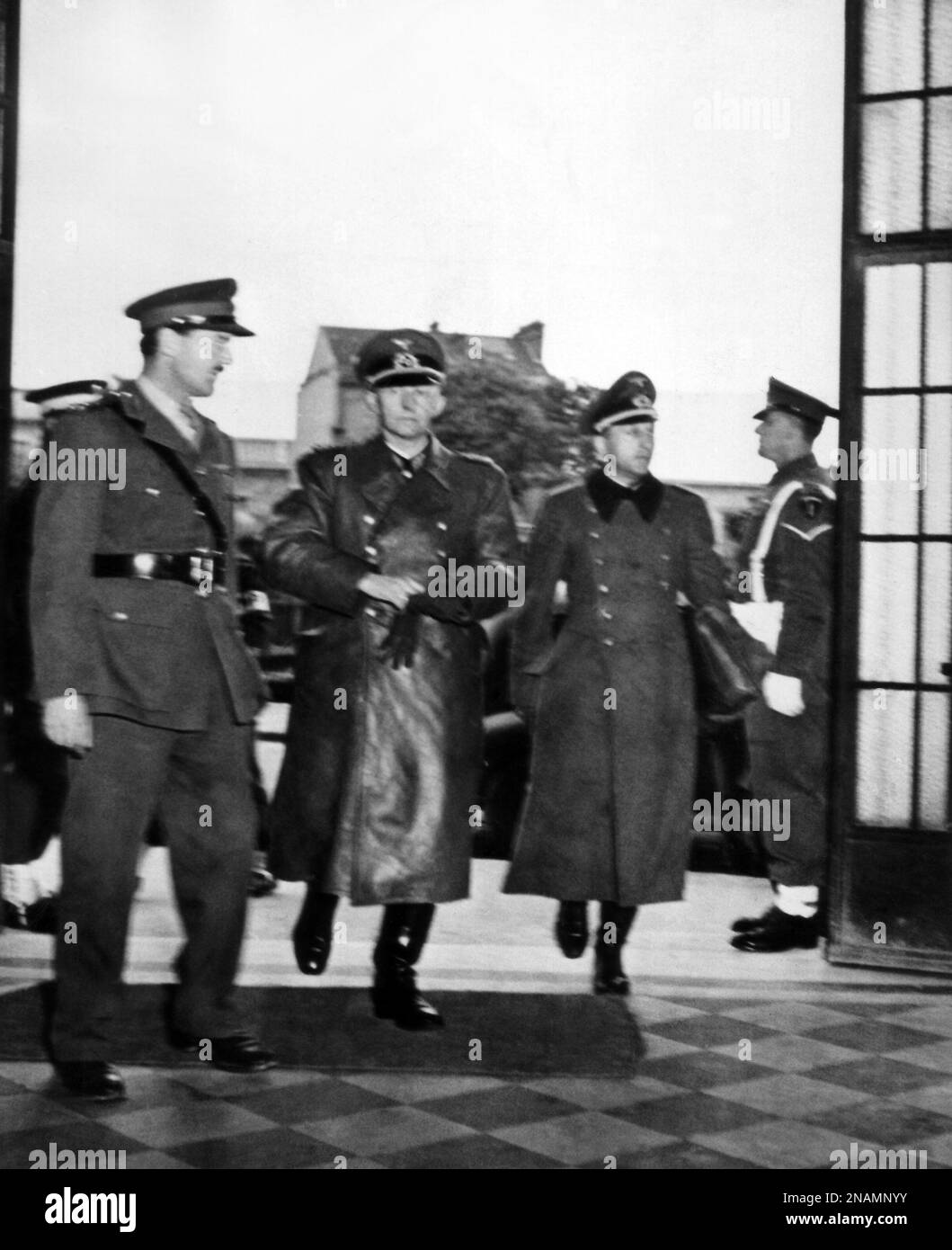 Col. Gen. Gustaf Jodl (second from left) German chief of staff and his ...