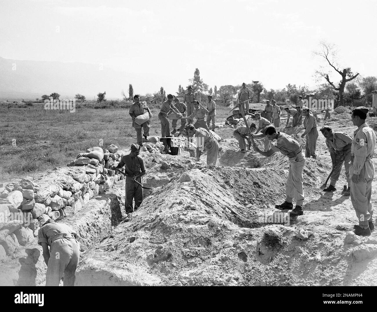 Greek troops are shown digging trenches near Yuog border in Greece on ...