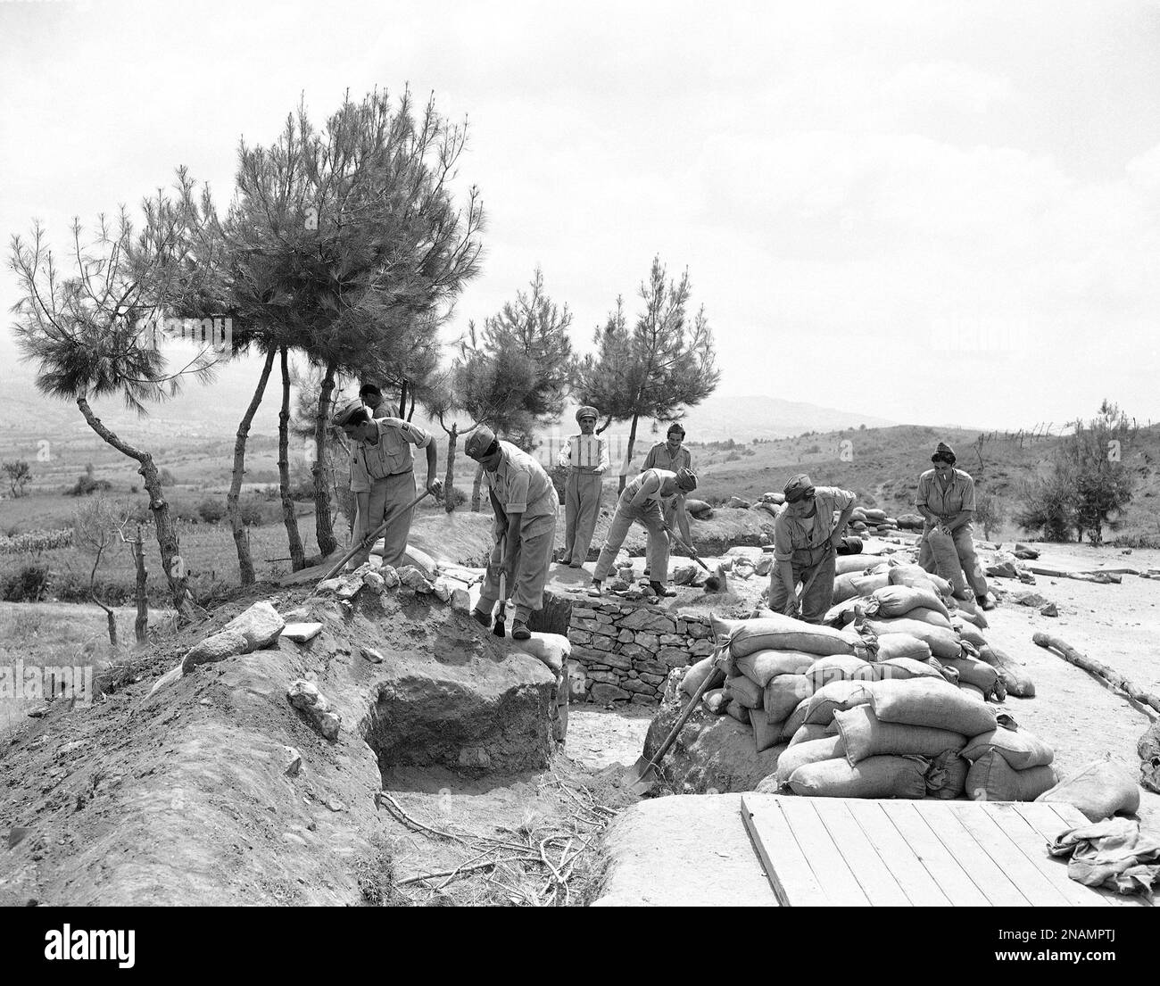 Greek soldiers build emplacements in a newly-established army outpost ...