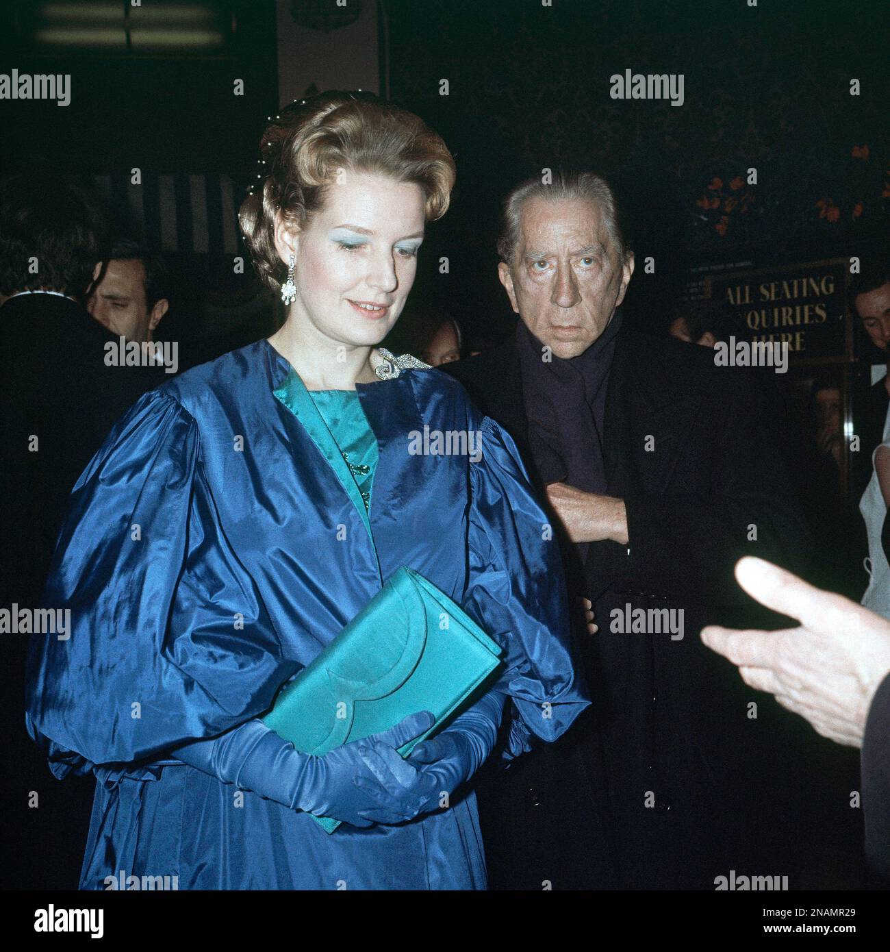 American oil millionaire Jean Paul Getty, background right, is arriving ...