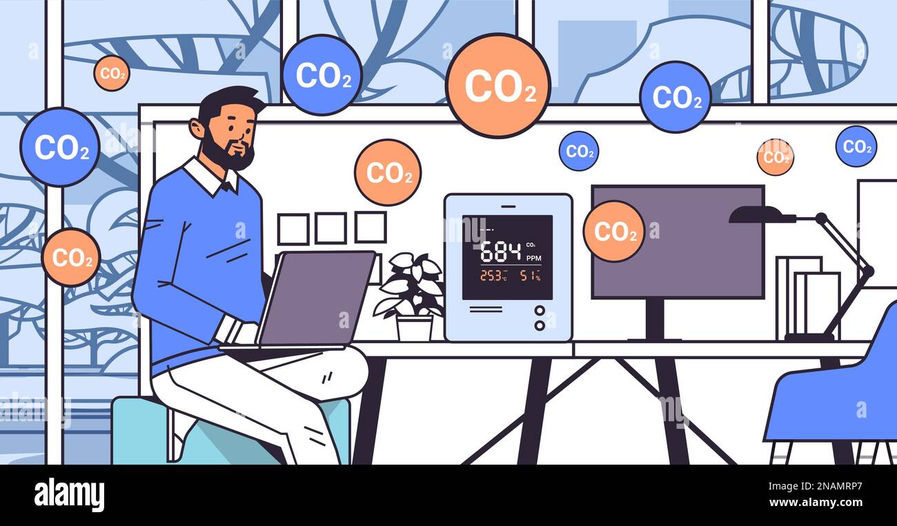businessman working in office with air quality monitor test on the ...