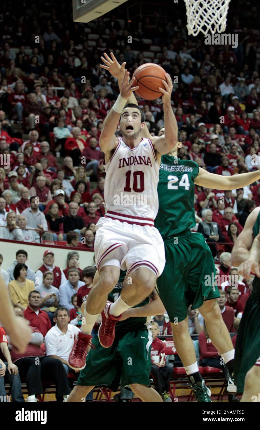 Indiana's Will Sheehey puts up a shot against Stetson's Liam McInerney ...