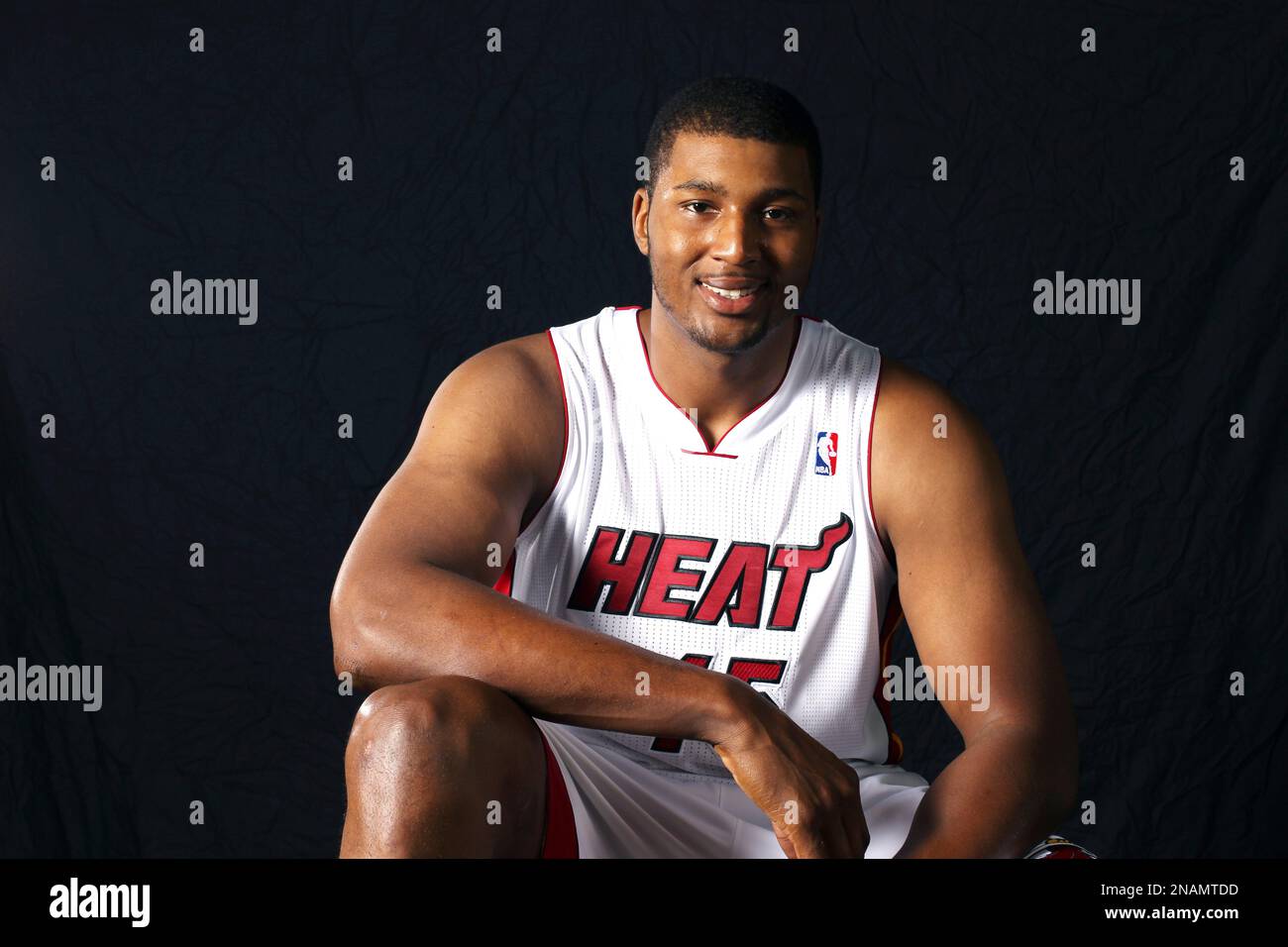 Miami Heat player Dexter Pittman poses for photos during the team's ...
