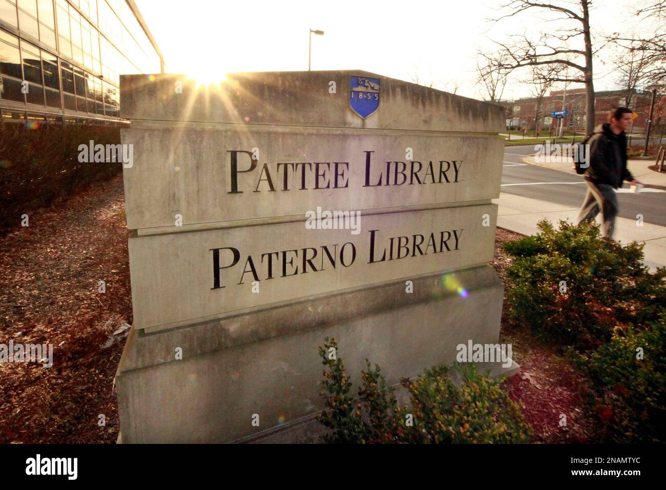 Penn State University students walk past the Paterno Library on campus ...