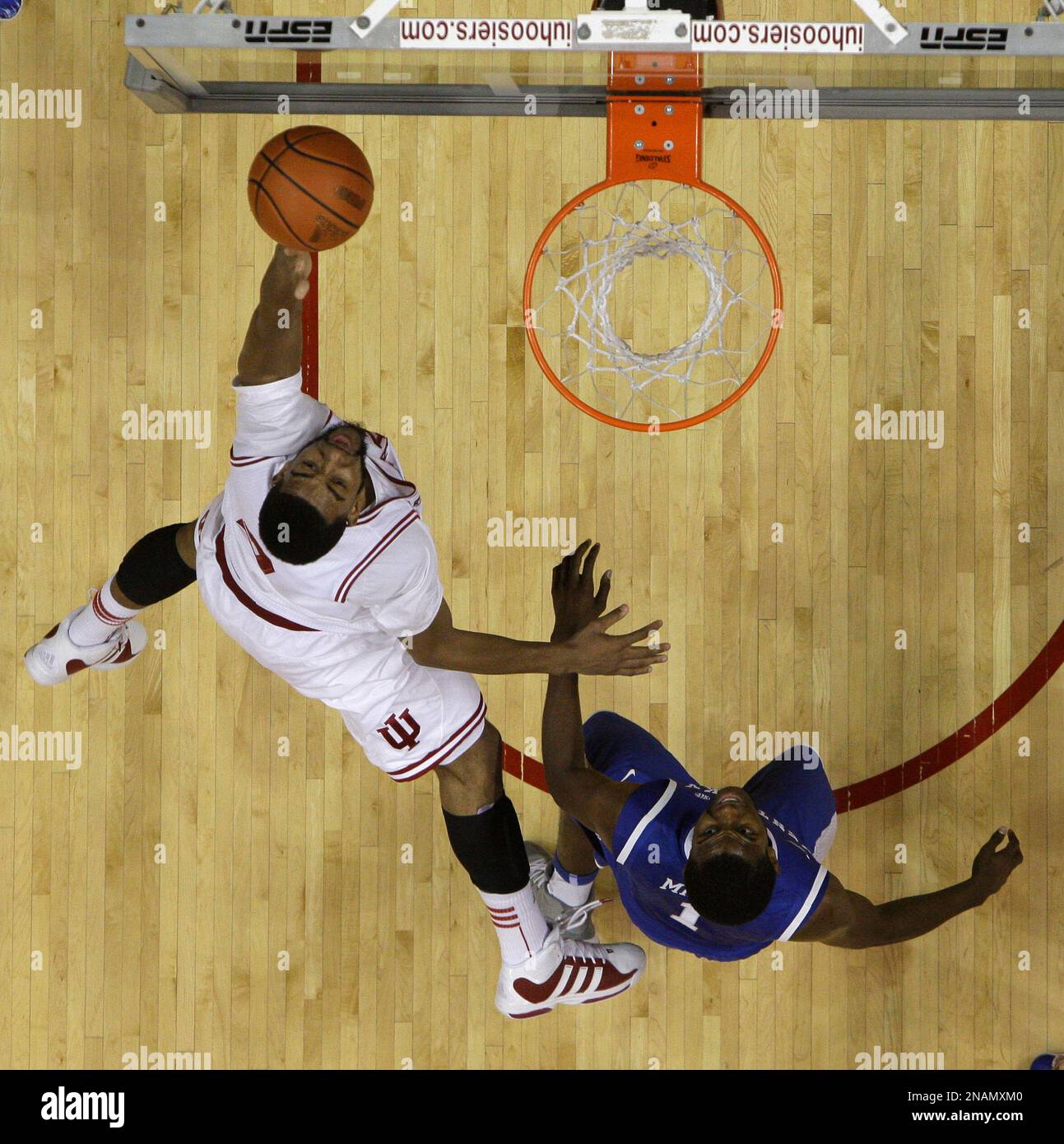 Indiana's Christian Watford shoots against Kentucky's Darius Miller ...