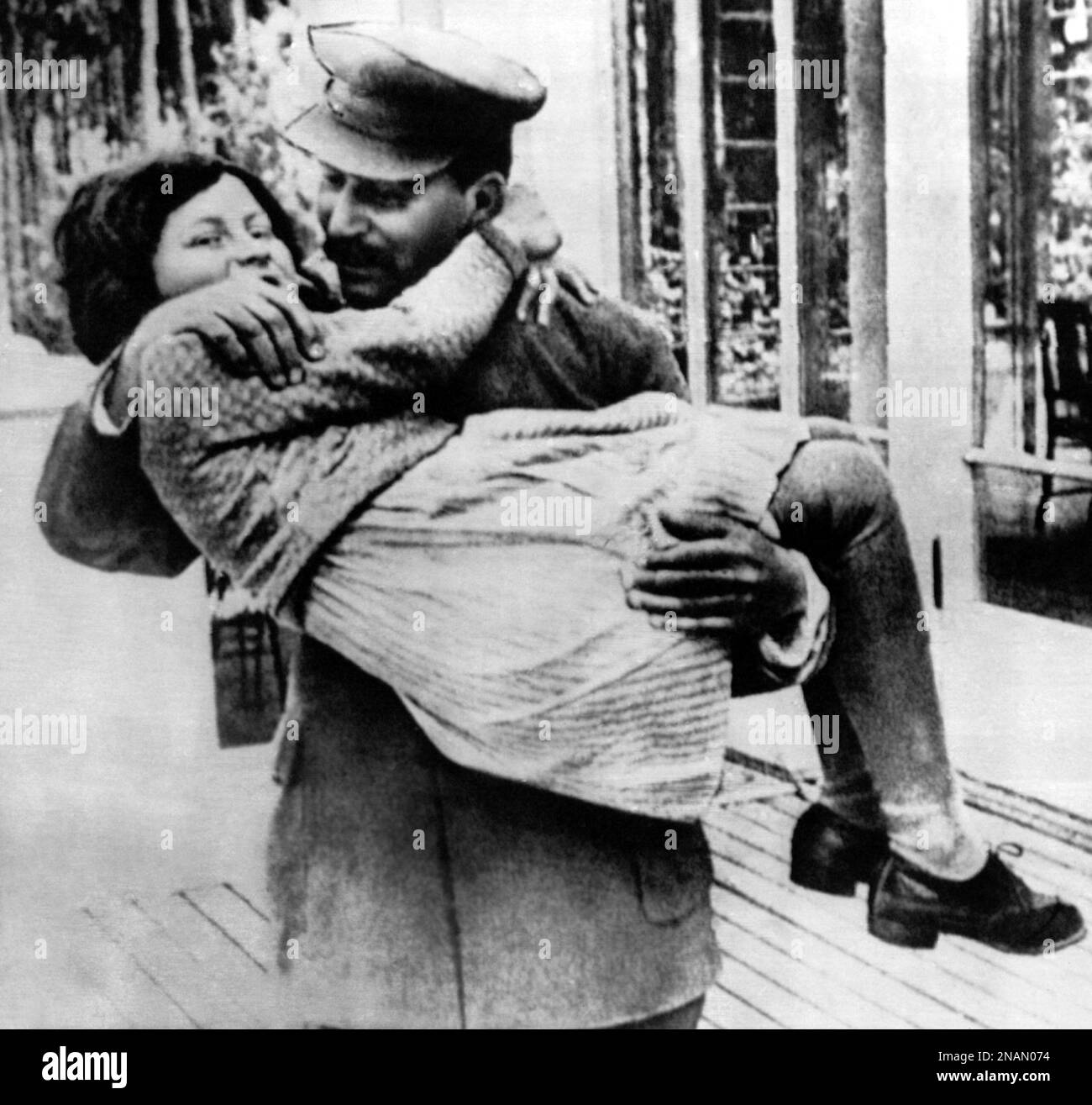 FILE - This 1936 file photo shows Joseph Stalin holding his daughter ...