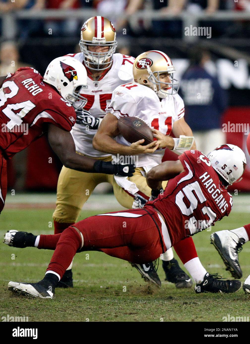 San Francisco 49ers quarterback Alex Smith (11) is sacked by Arizona ...