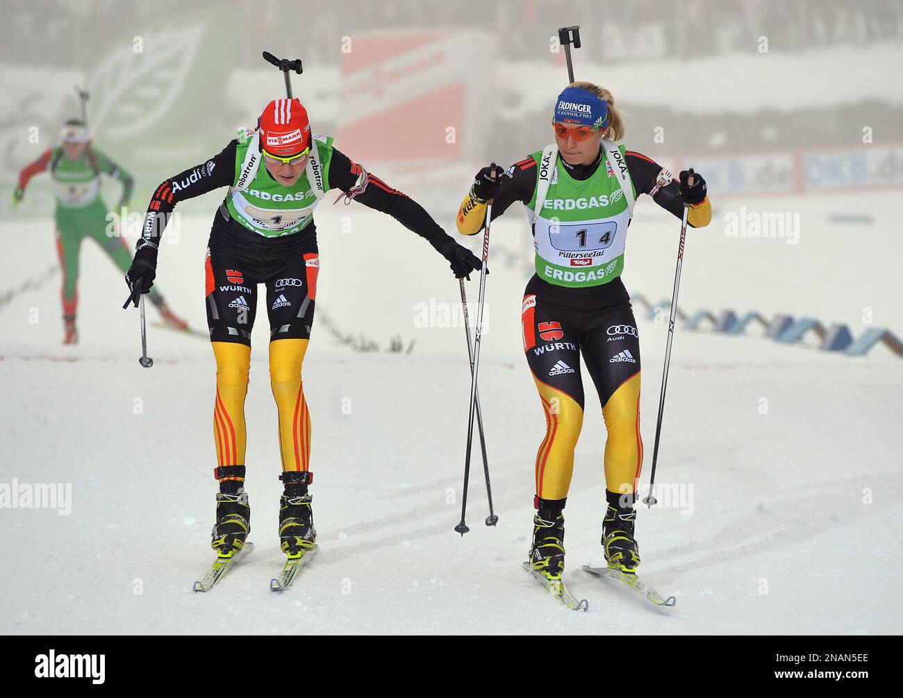 Germany's Tina Bachmann, left, hands over to her team mate Magdalena ...