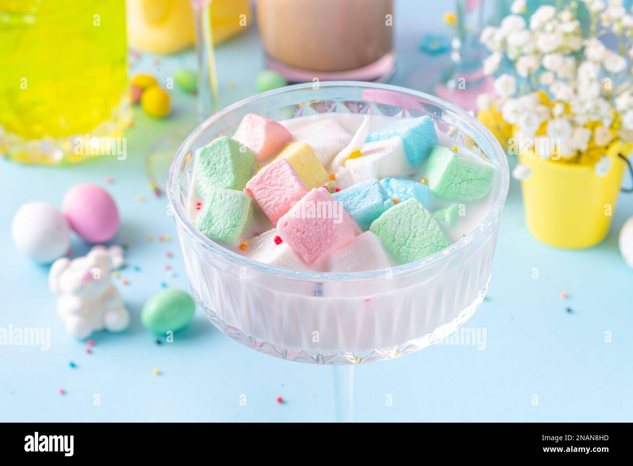 Colorful pastel colored kids Easter party mocktails, Creamy and iced non-alcohol drinks with ...