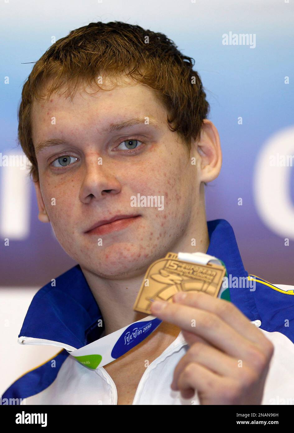 Ukraine's Sergiy Frolov shows off his bronze medal for the Men's 1500m ... Ukraine's Sergiy Frolov shows off his bronze medal for the Men's 1500m ...