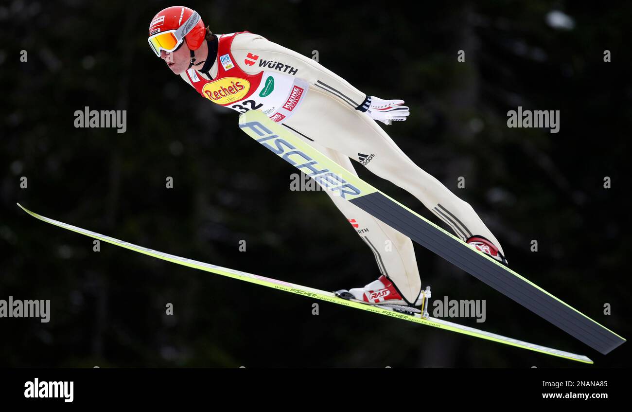 Johannes Rydzek of Germany soars through the air during the Nordic ...