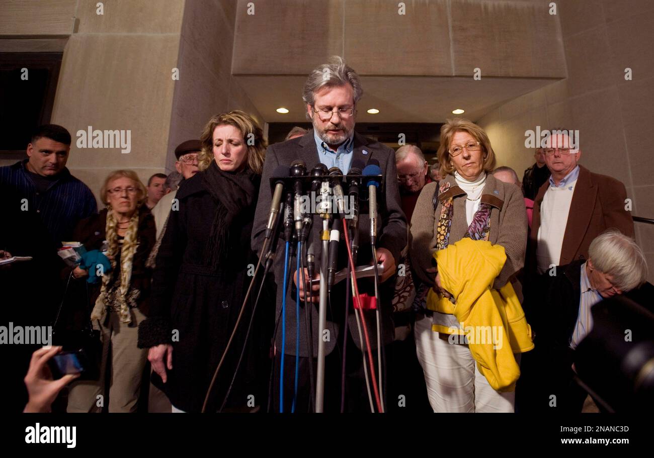 Dr. William Petit Jr., center, speaks to the media while surrounded by ...