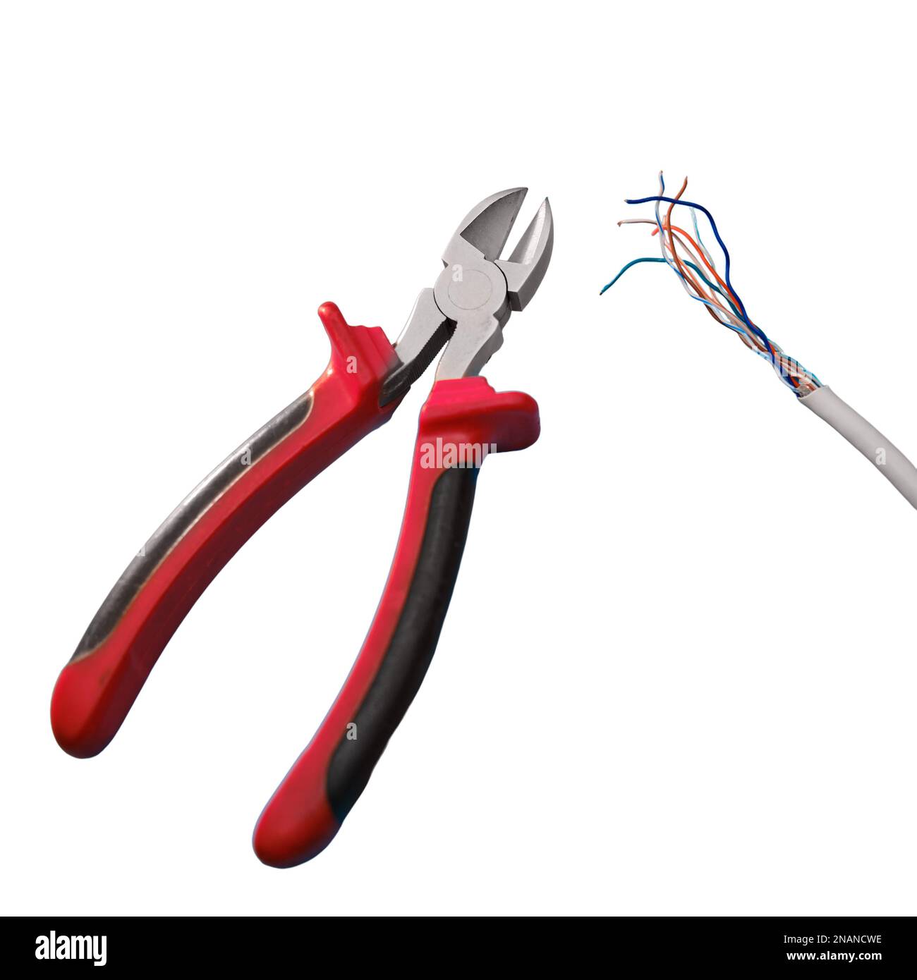 Cutting a computer network wire with wire cutters, isolated on a white ...