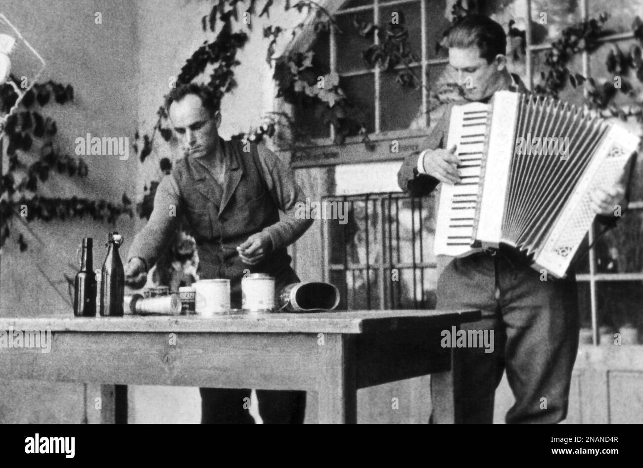 American civilian internees entertain their fellow internees at Ilag VII/Z in Germany with an ...