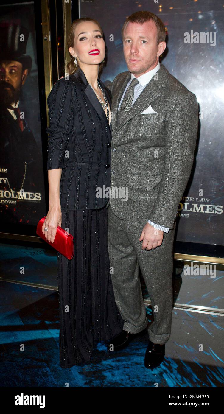 Director Guy Ritchie and girlfriend Jacqui Ainsley pose for ...
