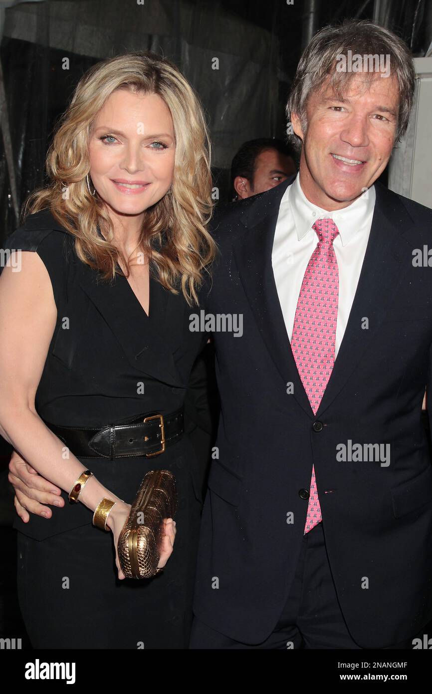 In this Dec. 7, 2011 photo, Michelle Pfieffer and David E. Kelley pose ...