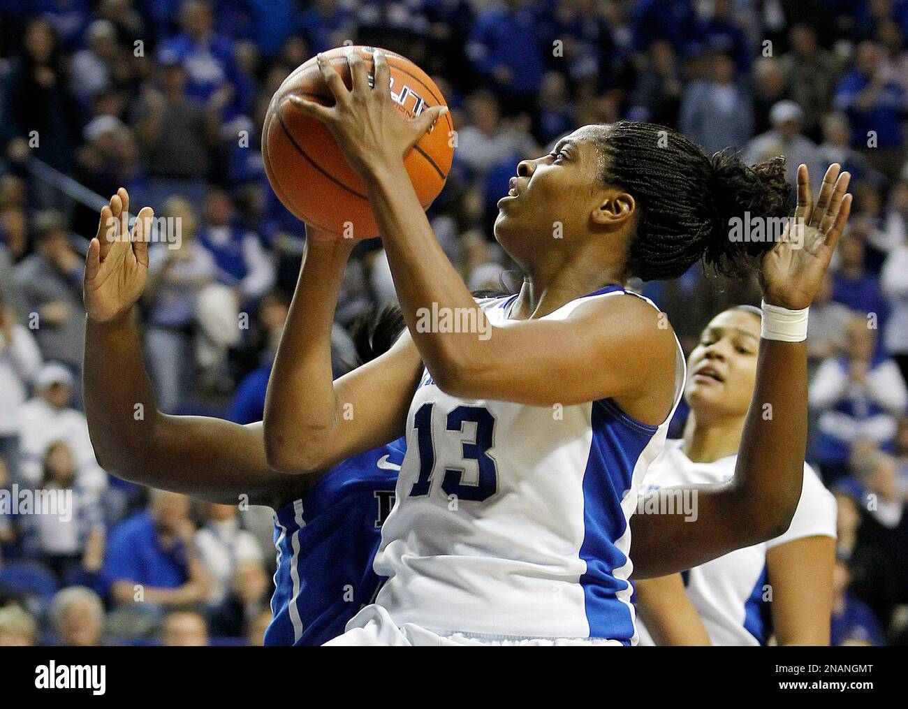 Kentucky's Bria Goss (13) shoots under pressure from Duke's Richa ...