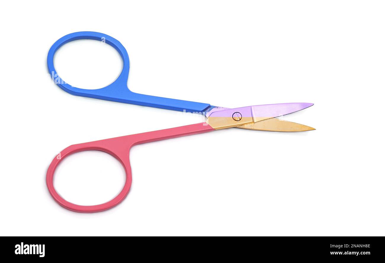 two color nail scissors on a white background Stock Photo - Alamy