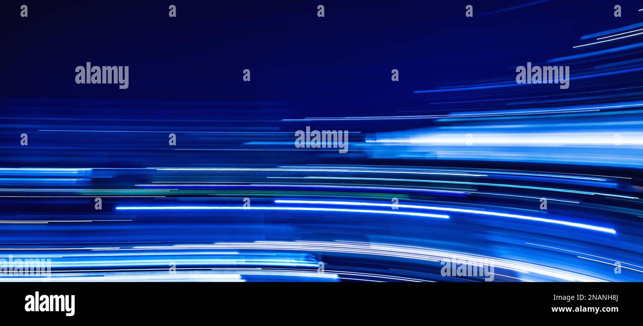 blue light trails in the dark Stock Photo - Alamy