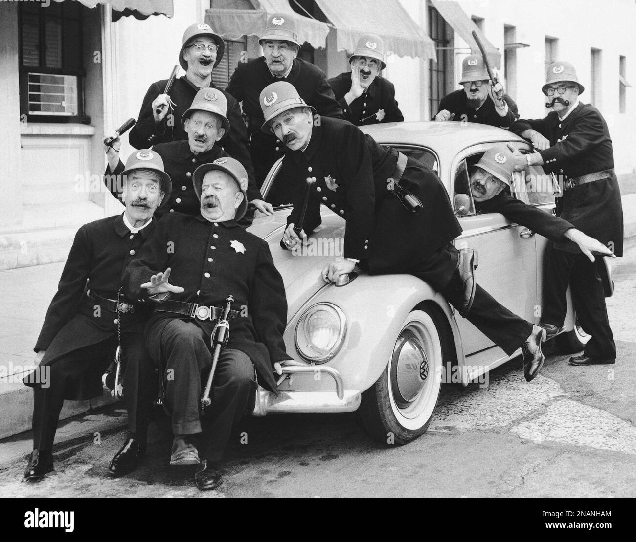 Eleven members of the famed Keystone Kops from the silent screen days ...