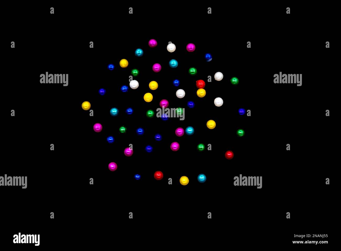 colorful pins on black background Stock Photo - Alamy