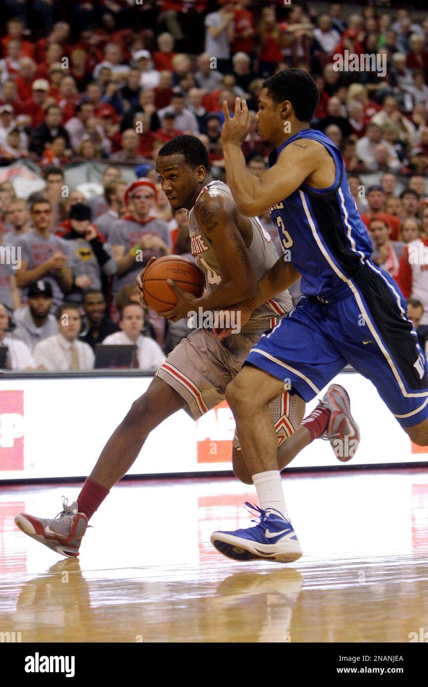 Ohio State's William Buford, right, plays against Duke's Michael ...