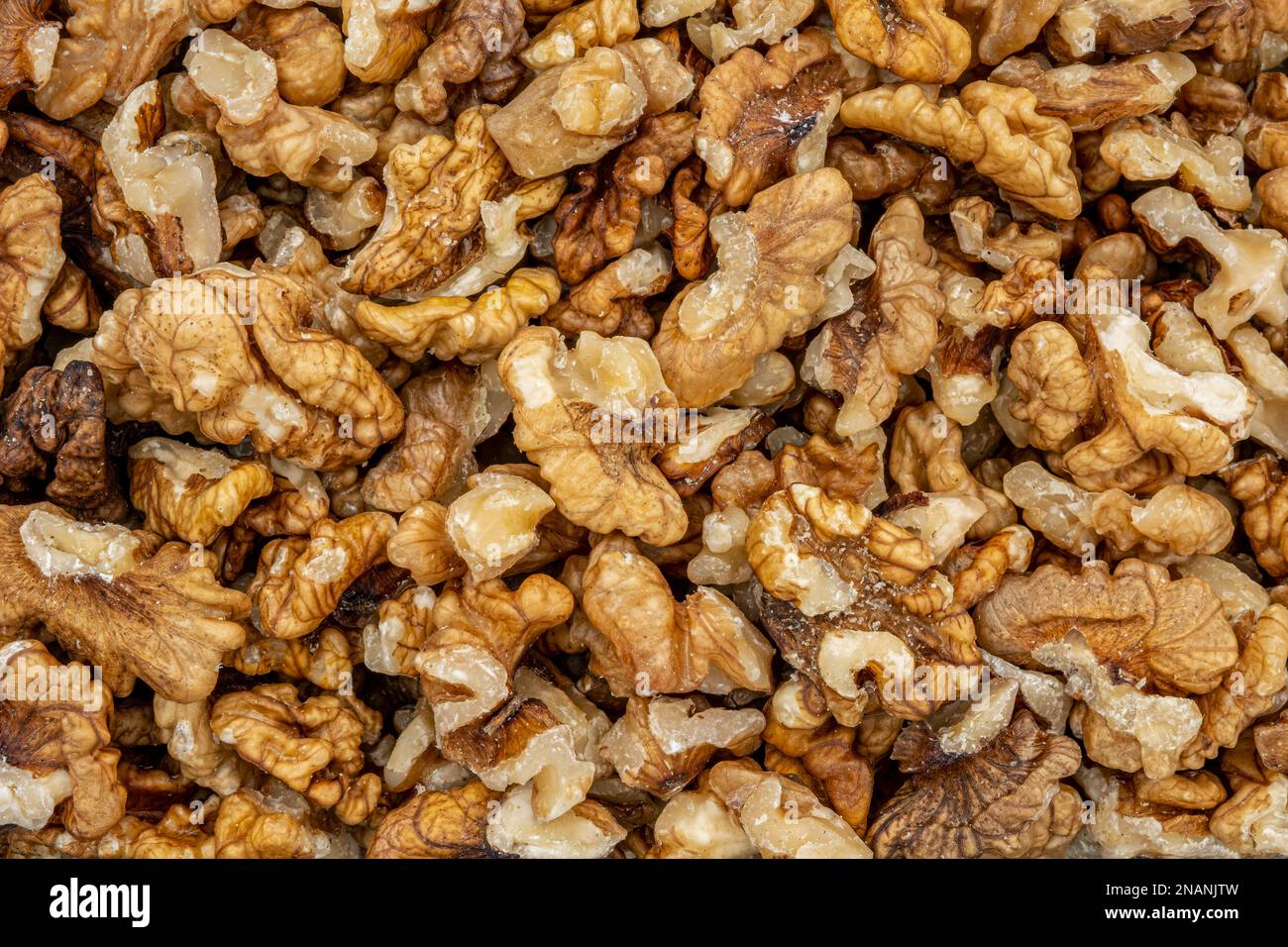 Pile of walnut kernels, top view. A closeup. Brain food, organic nuts ...
