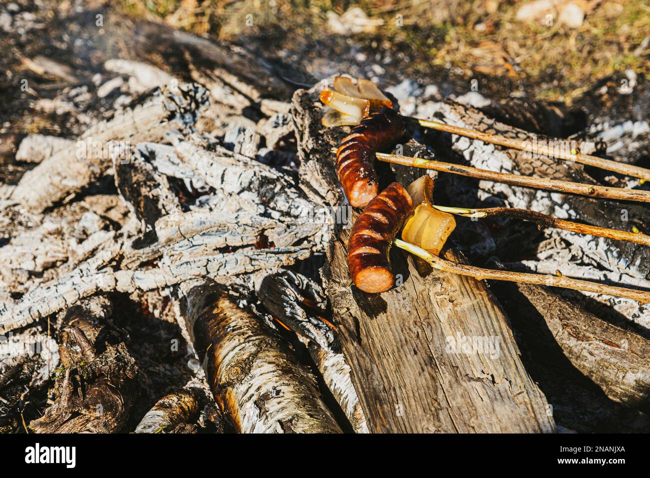 fried bacon and sausage on stick, slanina,traditional food in Romania ...