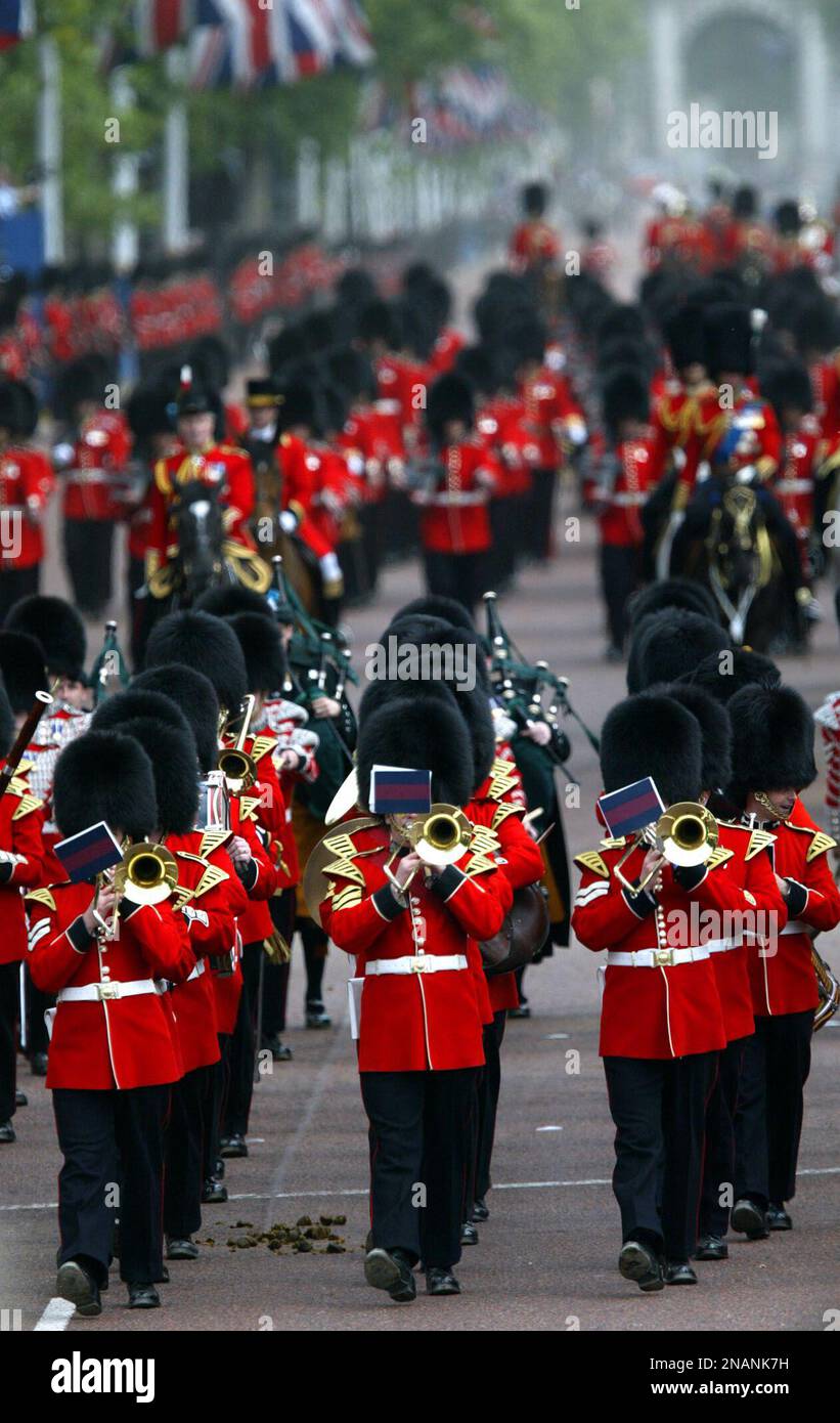 Massed bands march by Buckingham Palace during the Trooping of the ...