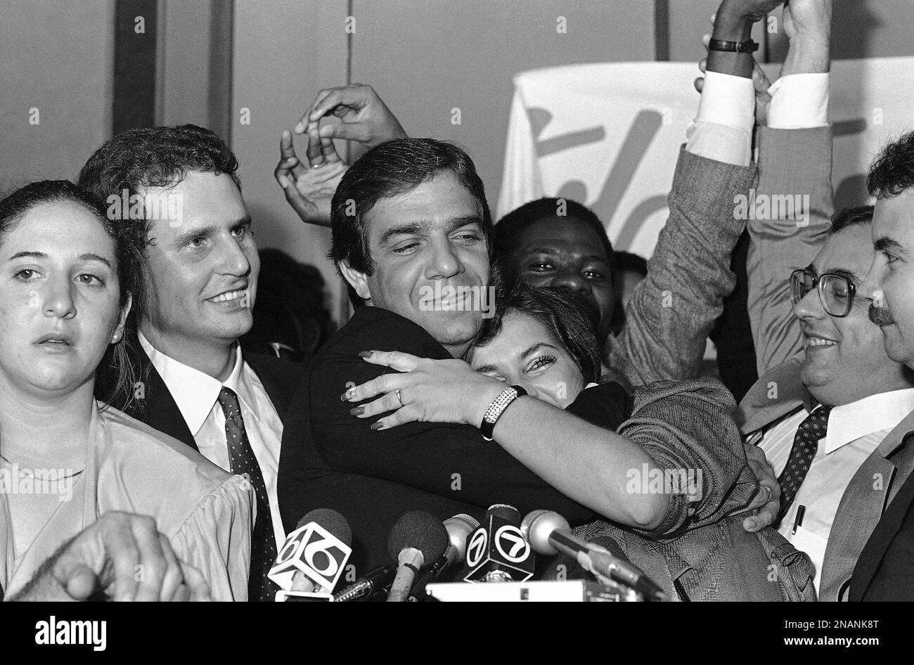 Miami attorney Xavier Suarez hugs his wife Rita after he took a ...