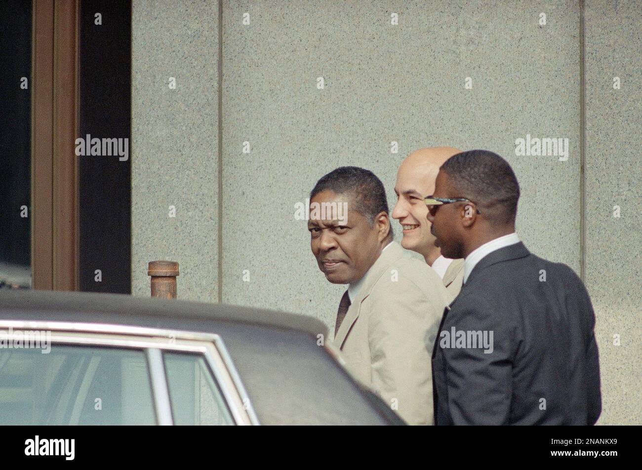 Convicted cocaine dealer Charles Lewis, left, arrives for another day ...