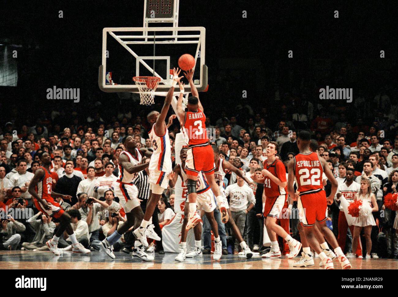 St. John’s Greg “Boo” Harvey (3) makes the basket at the sound of the ...