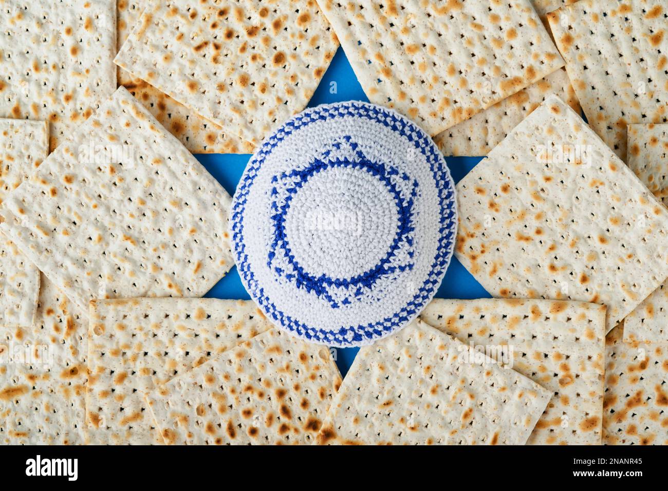 Passover celebration concept. Blue Star of David made from matzah ...