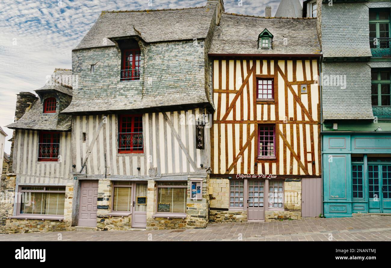 Medieval street with typical half-timbered houses in the French town of ...