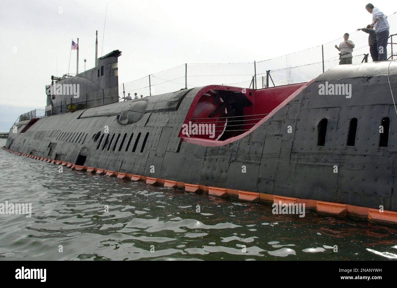 FILE - In a Aug. 28, 2002 file photo, visitors walk on the deck of the ...