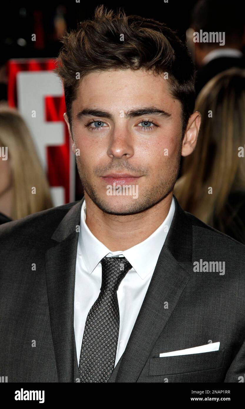 Zac Efron arrives at the premiere of "New Year's Eve" in Los Angeles on ...