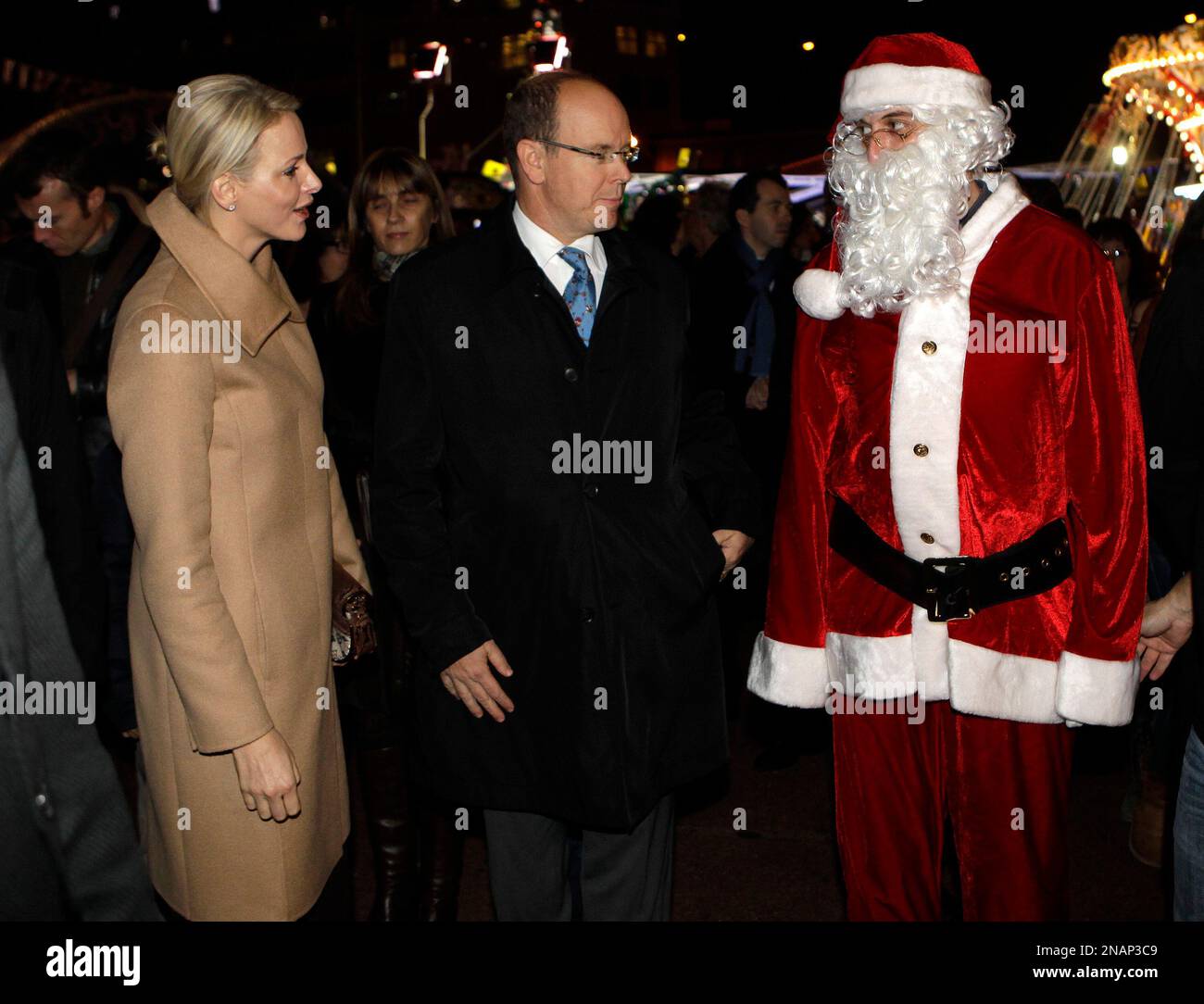 Prince Albert II of Monaco and his wife Princess Charlene meets a Santa ...