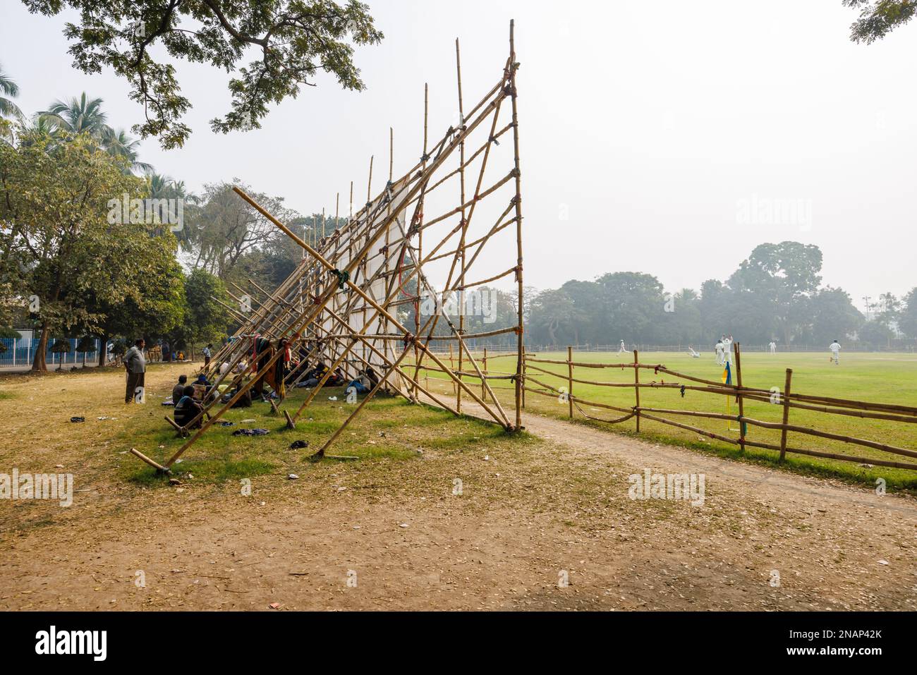 A sight screen on a bamboo pole structure at the cricket pitch in ...